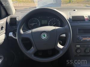 Melns Skoda Octavia 2007 Liepāja, ar dzinēja tilpumu 1.60 L un nobraukumu 168 tūkst. km par 4900 €, foto 19 vietnē AUTOMOTO.COM.LV