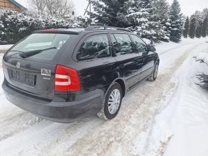 Black Skoda Octavia 2008 in Utena, with an engine capacity of 1.60 L and mileage of 227 thousand km for 2600 €, photo 3 on AUTOMOTO.COM.LV