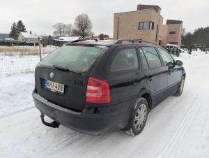 Black Skoda Octavia 2008 in Kaunas, with an engine capacity of 1.90 L and mileage of 400 thousand km for 1459 €, photo 4 on AUTOMOTO.COM.LV