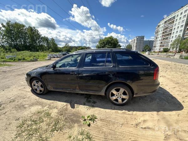 Black Skoda Octavia 2008 in Riga, with an engine capacity of 2.00 L and mileage of 394 thousand km for 700 €, photo 4 on AUTOMOTO.COM.LV