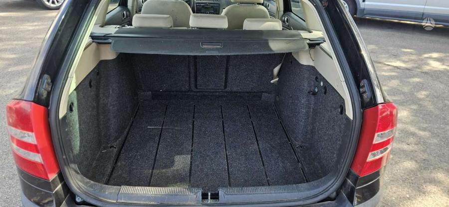 Melns Skoda Octavia 2008 Marijampole, ar dzinēja tilpumu 1.60 L un nobraukumu 330 tūkst. km par 2000 €, foto 11 vietnē AUTOMOTO.COM.LV