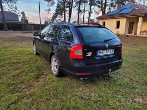 Black Skoda Octavia 2009 in Riga, with an engine capacity of 2.00 L and mileage of 310 thousand km for 1549 €, photo 3 on AUTOMOTO.COM.LV