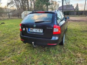 Black Skoda Octavia 2009 in Riga, with an engine capacity of 2.00 L and mileage of 310 thousand km for 1549 €, photo 6 on AUTOMOTO.COM.LV