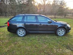 Black Skoda Octavia 2009 in Riga, with an engine capacity of 2.00 L and mileage of 310 thousand km for 1549 €, photo 7 on AUTOMOTO.COM.LV