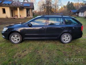 Black Skoda Octavia 2009 in Riga, with an engine capacity of 2.00 L and mileage of 310 thousand km for 1549 €, photo 8 on AUTOMOTO.COM.LV