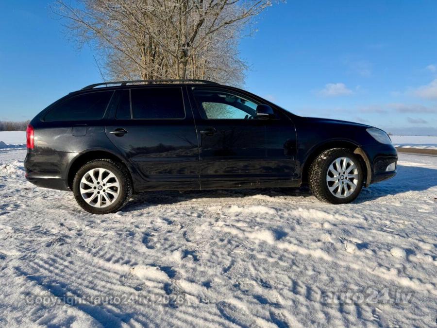 Melns Skoda Octavia 2009 Rakvere, ar dzinēja tilpumu 2.00 L un nobraukumu 247 tūkst. km par 4000 €, foto 3 vietnē AUTOMOTO.COM.LV