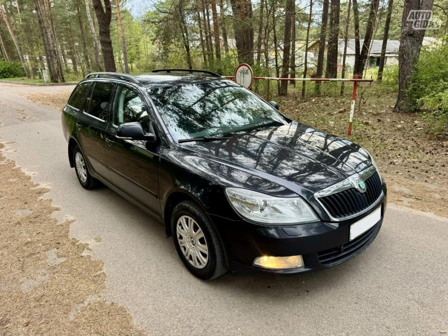 Black Skoda Octavia 2009 in Kaunas, with an engine capacity of 2.00 L and mileage of 230 thousand km for 3650 €, photo 3 on AUTOMOTO.COM.LV