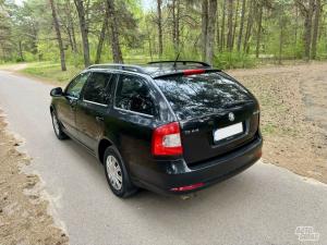 Black Skoda Octavia 2009 in Kaunas, with an engine capacity of 2.00 L and mileage of 230 thousand km for 3650 €, photo 5 on AUTOMOTO.COM.LV
