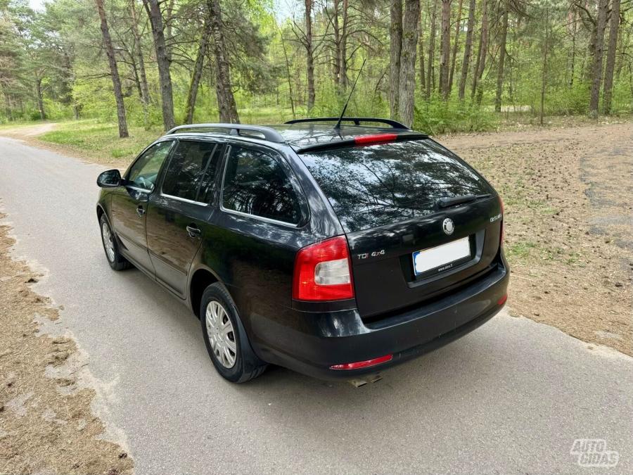Black Skoda Octavia 2009 in Kaunas, with an engine capacity of 2.00 L and mileage of 230 thousand km for 3650 €, photo 5 on AUTOMOTO.COM.LV