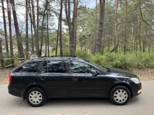 Black Skoda Octavia 2009 in Kaunas, with an engine capacity of 2.00 L and mileage of 230 thousand km for 3650 €, photo 14 on AUTOMOTO.COM.LV