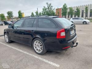 Black Skoda Octavia 2009 in Kaunas, with an engine capacity of 2.00 L and mileage of 310 thousand km for 1950 €, photo  on AUTOMOTO.COM.LV