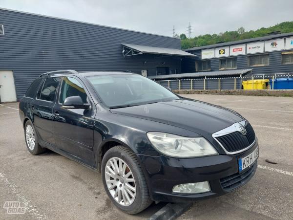Black Skoda Octavia 2009 in Kaunas, with an engine capacity of 2.00 L and mileage of 310 thousand km for 1950 €, photo 4 on AUTOMOTO.COM.LV