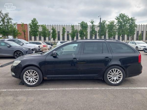 Black Skoda Octavia 2009 in Kaunas, with an engine capacity of 2.00 L and mileage of 310 thousand km for 1950 €, photo 7 on AUTOMOTO.COM.LV