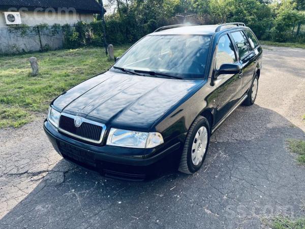 Black Skoda Octavia 2009 in Daugavpils, with an engine capacity of 1.90 L and mileage of 242 thousand km for 1649 €, photo 1 on AUTOMOTO.COM.LV