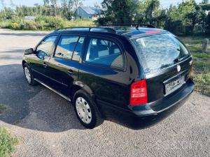 Black Skoda Octavia 2009 in Daugavpils, with an engine capacity of 1.90 L and mileage of 242 thousand km for 1649 €, photo 4 on AUTOMOTO.COM.LV