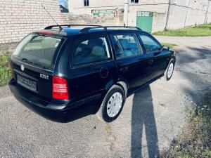 Black Skoda Octavia 2009 in Daugavpils, with an engine capacity of 1.90 L and mileage of 242 thousand km for 1649 €, photo 5 on AUTOMOTO.COM.LV