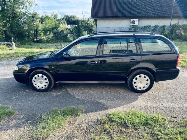 Black Skoda Octavia 2009 in Daugavpils, with an engine capacity of 1.90 L and mileage of 242 thousand km for 1649 €, photo 5 on AUTOMOTO.COM.LV