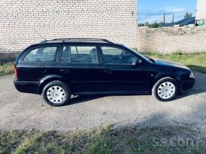 Black Skoda Octavia 2009 in Daugavpils, with an engine capacity of 1.90 L and mileage of 242 thousand km for 1649 €, photo 7 on AUTOMOTO.COM.LV