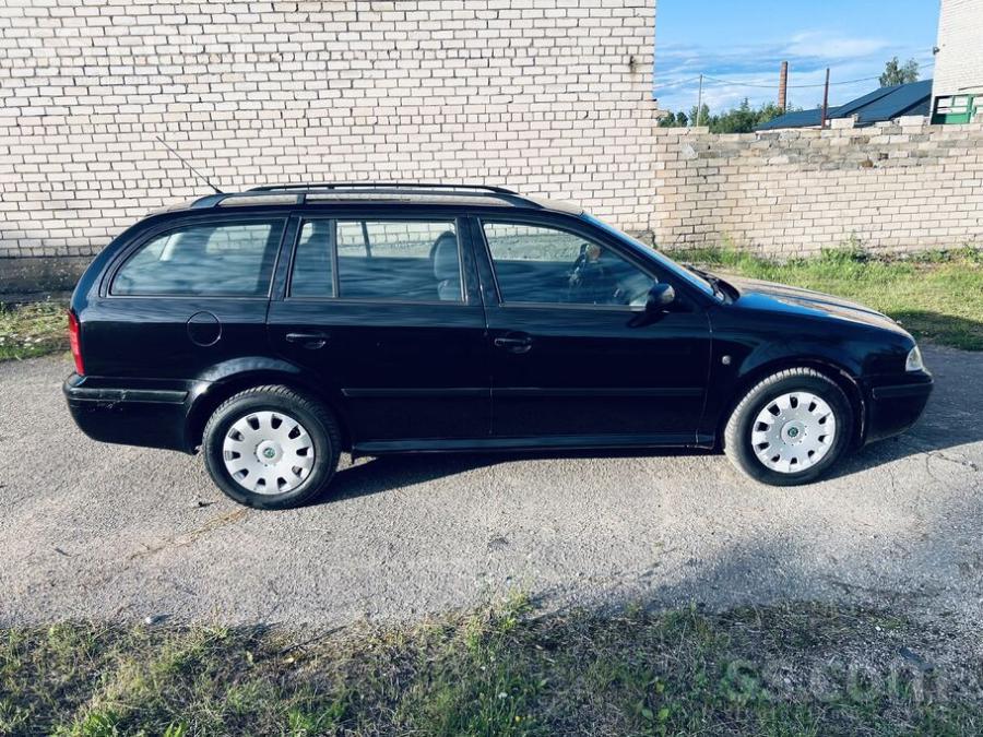 Black Skoda Octavia 2009 in Daugavpils, with an engine capacity of 1.90 L and mileage of 242 thousand km for 1649 €, photo 7 on AUTOMOTO.COM.LV