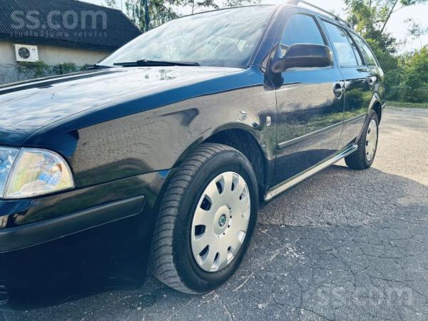 Black Skoda Octavia 2009 in Daugavpils, with an engine capacity of 1.90 L and mileage of 242 thousand km for 1649 €, photo 9 on AUTOMOTO.COM.LV