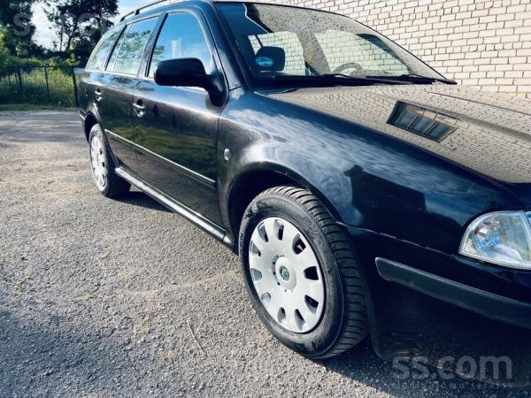 Black Skoda Octavia 2009 in Daugavpils, with an engine capacity of 1.90 L and mileage of 242 thousand km for 1649 €, photo 10 on AUTOMOTO.COM.LV