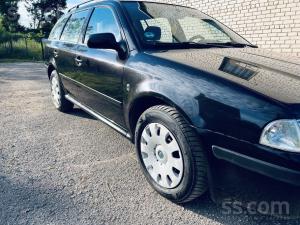 Black Skoda Octavia 2009 in Daugavpils, with an engine capacity of 1.90 L and mileage of 242 thousand km for 1649 €, photo 11 on AUTOMOTO.COM.LV