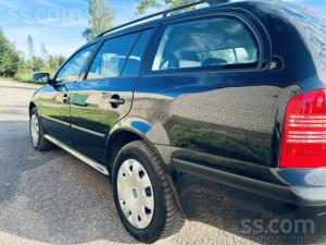 Black Skoda Octavia 2009 in Daugavpils, with an engine capacity of 1.90 L and mileage of 242 thousand km for 1649 €, photo 12 on AUTOMOTO.COM.LV