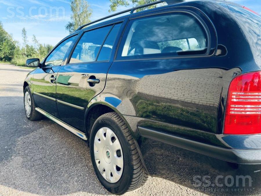 Black Skoda Octavia 2009 in Daugavpils, with an engine capacity of 1.90 L and mileage of 242 thousand km for 1649 €, photo 12 on AUTOMOTO.COM.LV