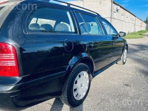 Black Skoda Octavia 2009 in Daugavpils, with an engine capacity of 1.90 L and mileage of 242 thousand km for 1649 €, photo 13 on AUTOMOTO.COM.LV