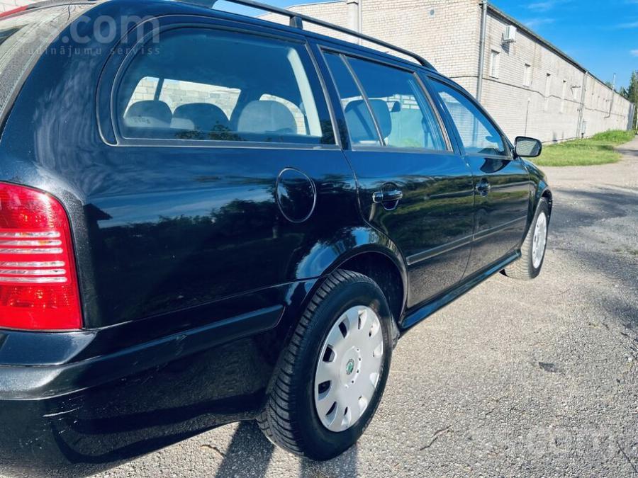 Black Skoda Octavia 2009 in Daugavpils, with an engine capacity of 1.90 L and mileage of 242 thousand km for 1649 €, photo 13 on AUTOMOTO.COM.LV