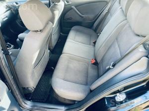 Black Skoda Octavia 2009 in Daugavpils, with an engine capacity of 1.90 L and mileage of 242 thousand km for 1649 €, photo 19 on AUTOMOTO.COM.LV
