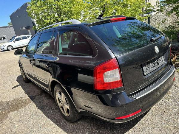 Black Skoda Octavia 2009 in Kelme, with an engine capacity of 1.80 L and mileage of 208 thousand km for 2300 €, photo 6 on AUTOMOTO.COM.LV