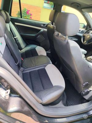 Black Skoda Octavia 2009 in Moletai, with an engine capacity of 1.97 L and mileage of 395 thousand km for 2300 €, photo 12 on AUTOMOTO.COM.LV