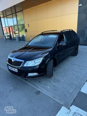 Black Skoda Octavia 2009 in Klaipeda, with an engine capacity of 1.90 L and mileage of 283 thousand km for 3100 €, photo 14 on AUTOMOTO.COM.LV