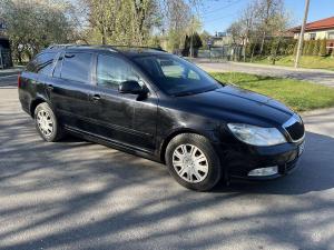 Black Skoda Octavia 2009 in Vilnius, with an engine capacity of 1.60 L and mileage of 268 thousand km for 1899 €, photo 3 on AUTOMOTO.COM.LV