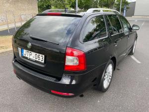 Black Skoda Octavia 2009 in Vilnius, with an engine capacity of 1.80 L and mileage of 250 thousand km for 4950 €, photo 5 on AUTOMOTO.COM.LV
