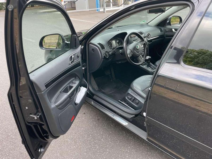 Black Skoda Octavia 2009 in Vilnius, with an engine capacity of 1.80 L and mileage of 250 thousand km for 4950 €, photo 6 on AUTOMOTO.COM.LV