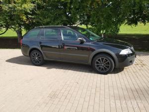 Black Skoda Octavia 2009 in Talsi, with an engine capacity of 1.80 L and mileage of 231 thousand km for 3250 €, photo 6 on AUTOMOTO.COM.LV