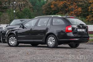 Black Skoda Octavia 2009 in Riga, with an engine capacity of 1.80 L and mileage of 143 thousand km for 4990 €, photo 4 on AUTOMOTO.COM.LV