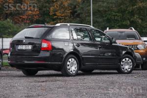 Black Skoda Octavia 2009 in Riga, with an engine capacity of 1.80 L and mileage of 143 thousand km for 4990 €, photo 5 on AUTOMOTO.COM.LV