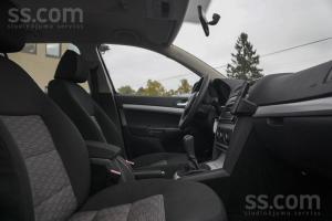 Black Skoda Octavia 2009 in Riga, with an engine capacity of 1.80 L and mileage of 143 thousand km for 4990 €, photo 6 on AUTOMOTO.COM.LV