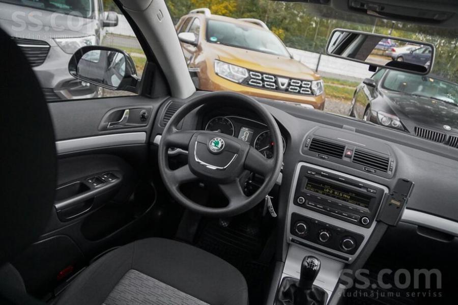 Black Skoda Octavia 2009 in Riga, with an engine capacity of 1.80 L and mileage of 143 thousand km for 4990 €, photo 8 on AUTOMOTO.COM.LV