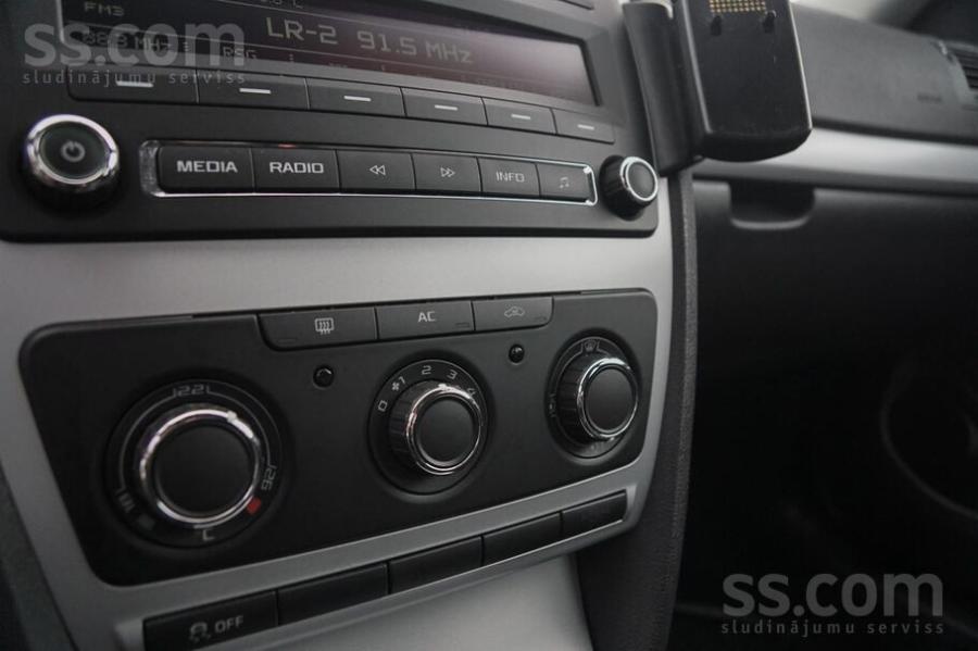 Black Skoda Octavia 2009 in Riga, with an engine capacity of 1.80 L and mileage of 143 thousand km for 4990 €, photo 14 on AUTOMOTO.COM.LV