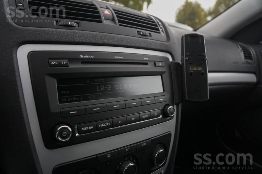 Black Skoda Octavia 2009 in Riga, with an engine capacity of 1.80 L and mileage of 143 thousand km for 4990 €, photo 15 on AUTOMOTO.COM.LV