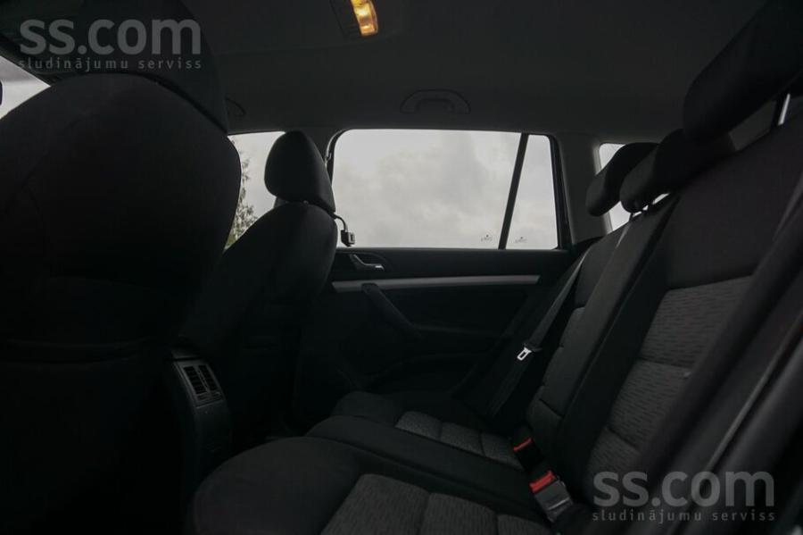 Black Skoda Octavia 2009 in Riga, with an engine capacity of 1.80 L and mileage of 143 thousand km for 4990 €, photo 19 on AUTOMOTO.COM.LV