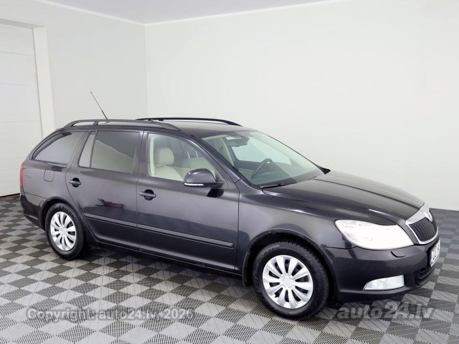 Black Skoda Octavia 2009 in Tallinn, with an engine capacity of 2.00 L and mileage of 311 thousand km for 1499 €, photo 1 on AUTOMOTO.COM.LV
