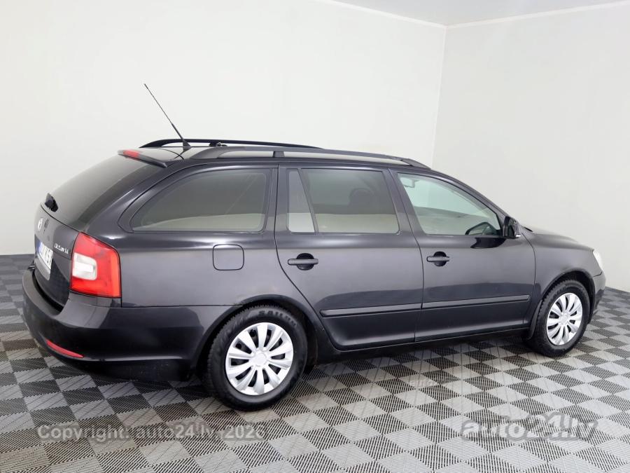 Black Skoda Octavia 2009 in Tallinn, with an engine capacity of 2.00 L and mileage of 311 thousand km for 1499 €, photo 4 on AUTOMOTO.COM.LV