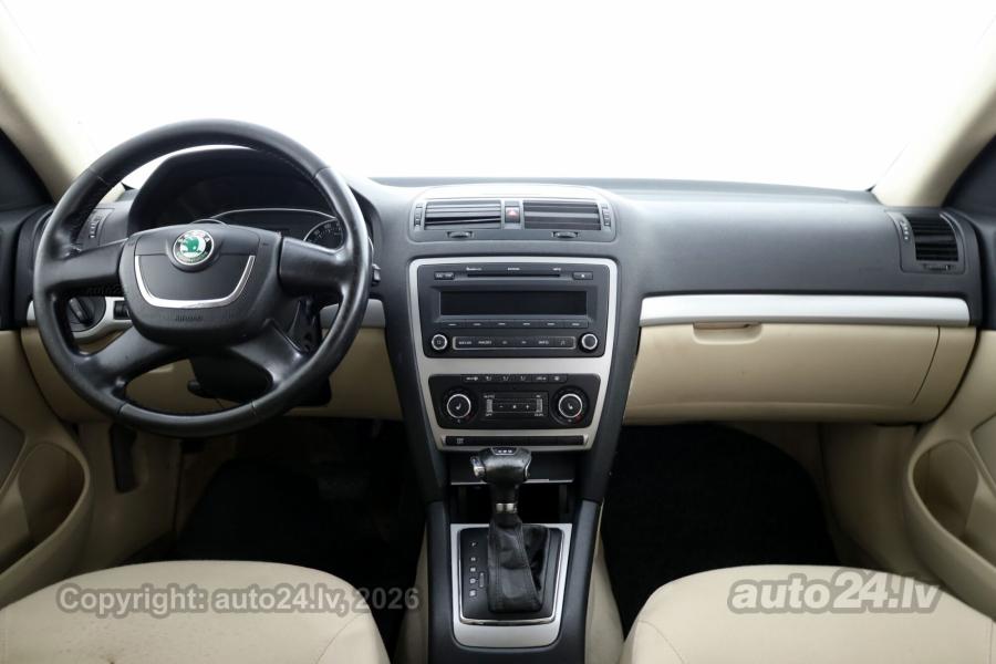 Black Skoda Octavia 2009 in Tallinn, with an engine capacity of 2.00 L and mileage of 311 thousand km for 1499 €, photo 6 on AUTOMOTO.COM.LV