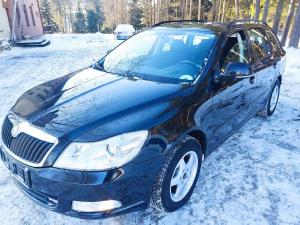 Black Skoda Octavia 2010 in Utena, with an engine capacity of 1.60 L and mileage of 268 thousand km for 3300 €, photo  on AUTOMOTO.COM.LV