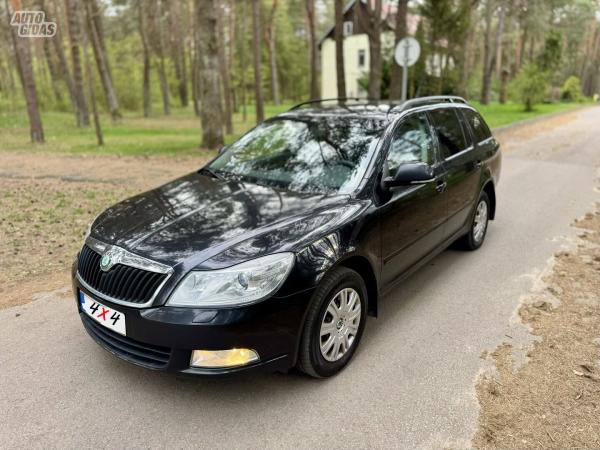 Black Skoda Octavia 2010 in Kaunas, with an engine capacity of 2.00 L and mileage of 230 thousand km for 3650 €, photo 1 on AUTOMOTO.COM.LV